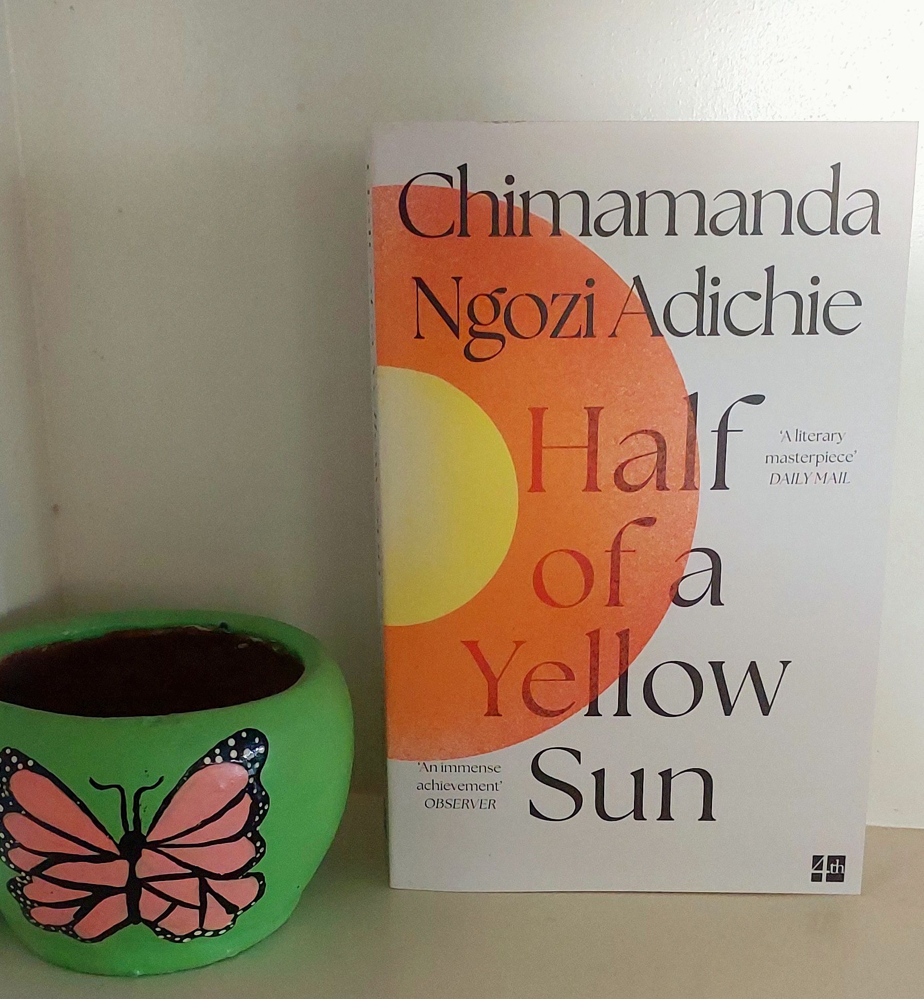 Half ofa yellow sun by Chimamanda - Books and More | Take App